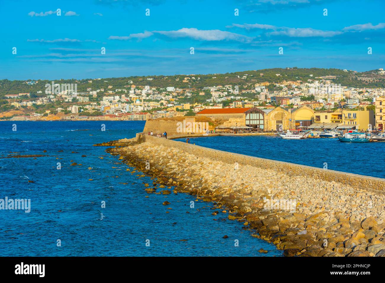 Historical building at a breakwater of Venetian port of Chania at Crete ...