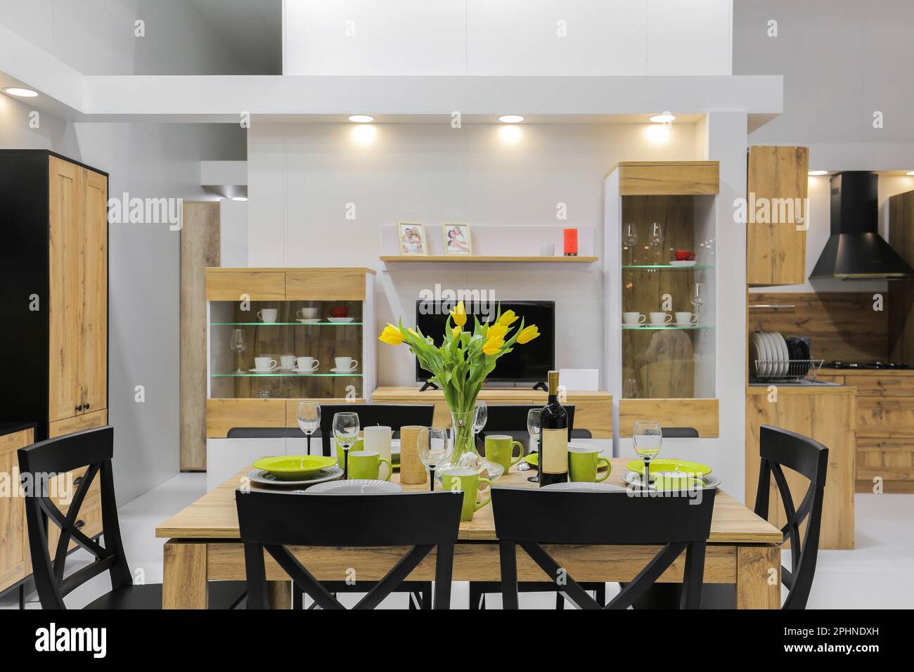 Cozy served table in home interior Stock Photo - Alamy