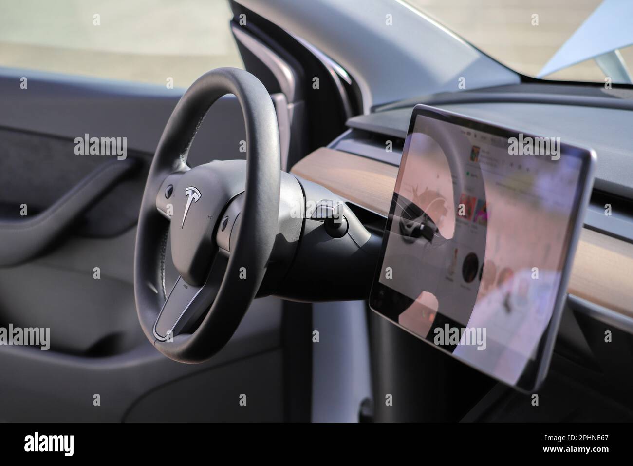 Driver's seat of the interior car Tesla Model Y Stock Photo - Alamy