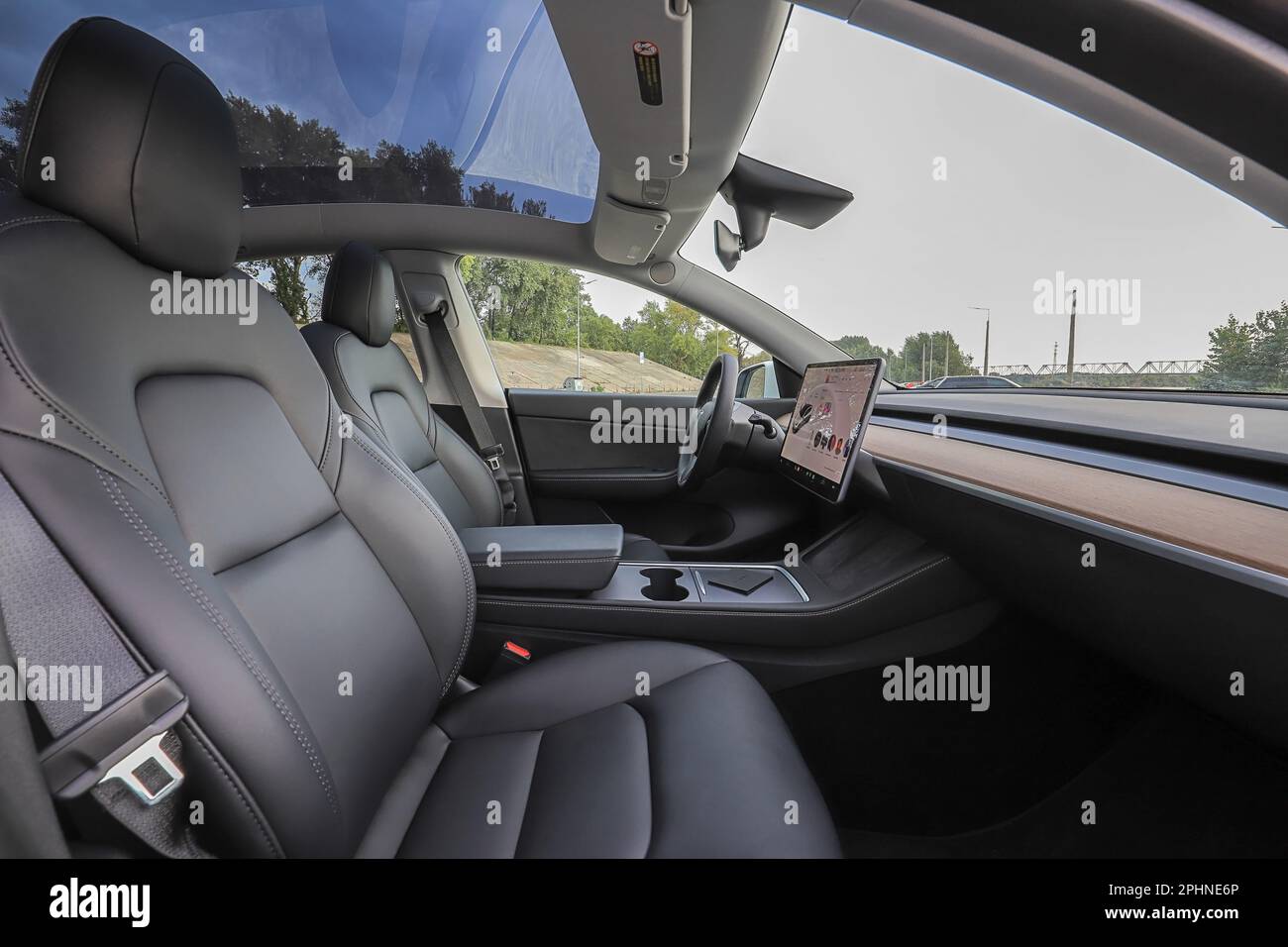 Driver's seat of the interior car Tesla Model Y Stock Photo - Alamy