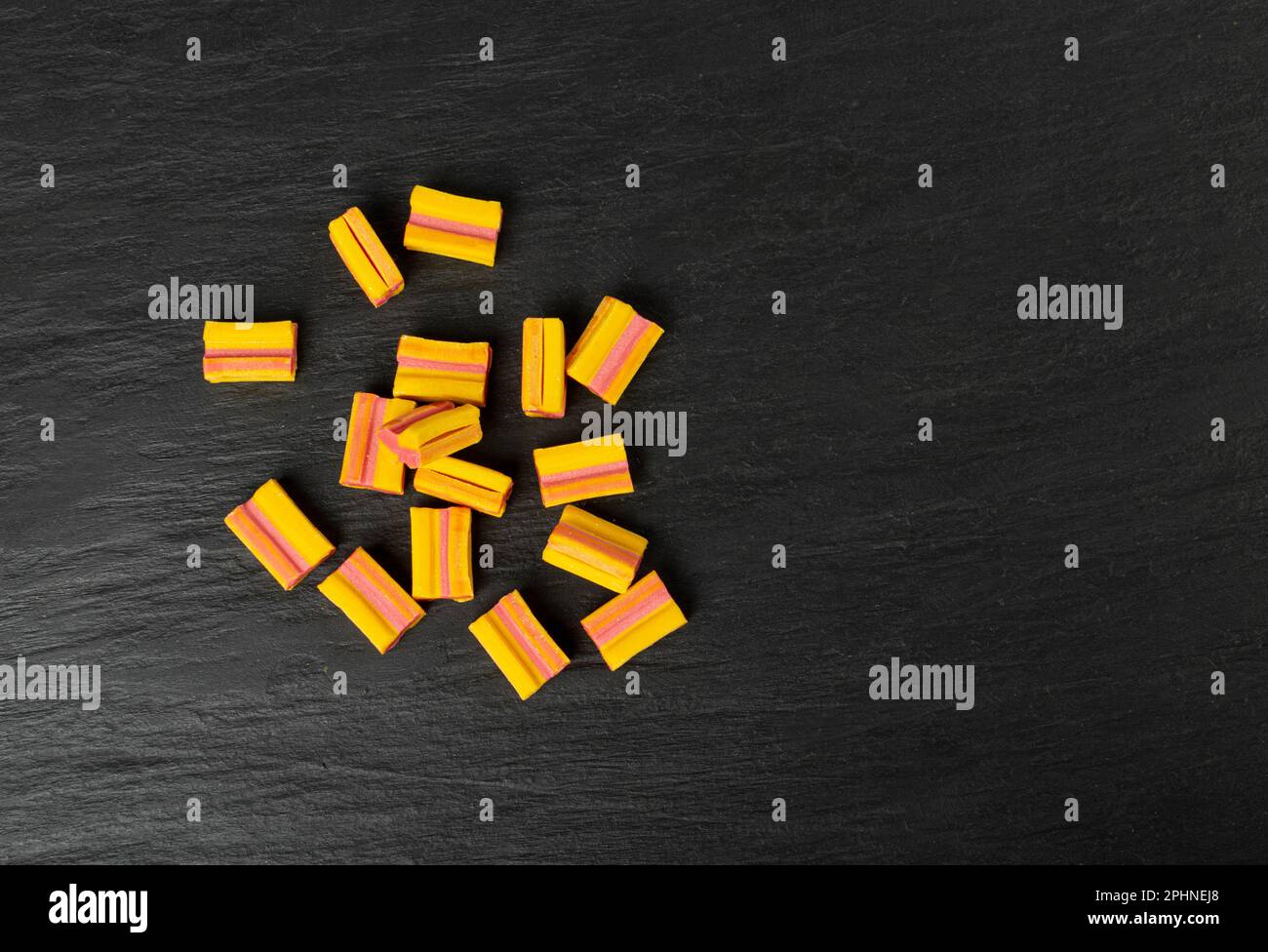 Chewing Gum Cubes Pile on Black Plate, Fruit Color Bubble Gum Set ...