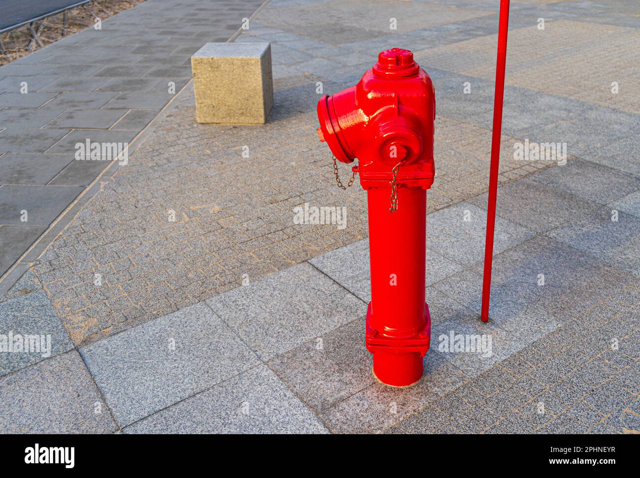 A Fire Hydrant, Waterplug, or Firecock on City Street, Red Steel Pipe ...