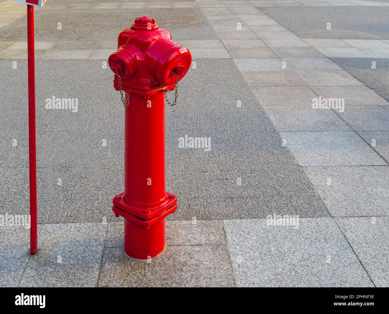 A Fire Hydrant, Waterplug, or Firecock on City Street, Red Steel Pipe ...
