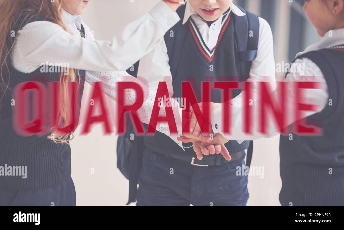 Red quarantine word. Group of kids in school uniform standing together ...