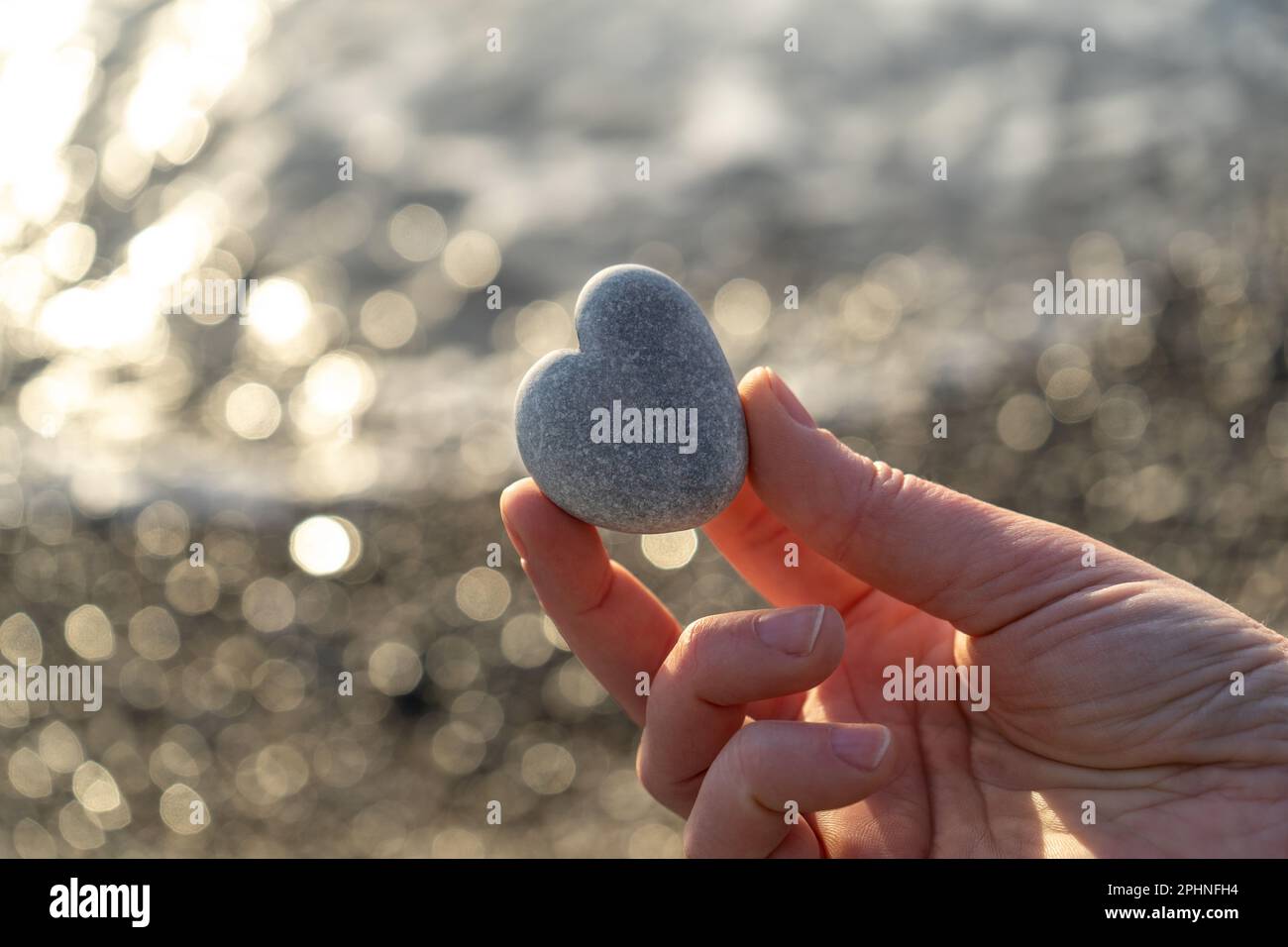 Stone Heart on Pebble Beach, Shining Ocean Water, Rocky Shore Love ...