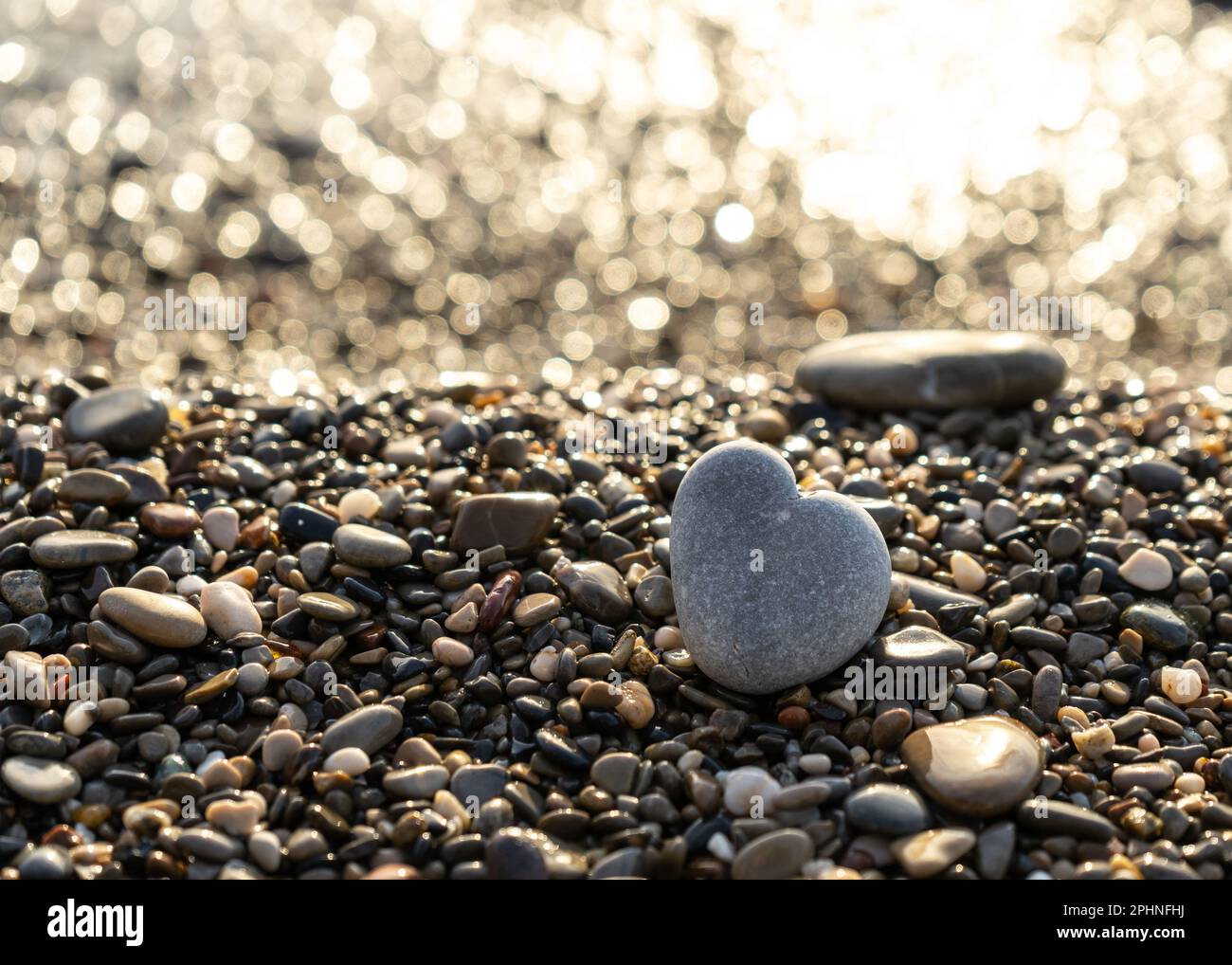 Stone Heart on Pebble Beach, Shining Ocean Water, Rocky Shore Love ...