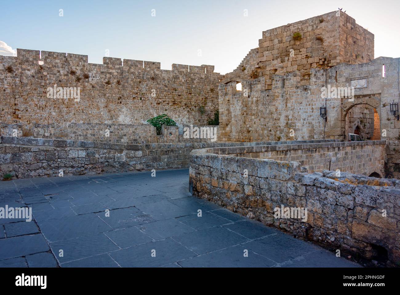 Sunrise view of the Saint Athanasios gate of Rhodes in Greece Stock ...