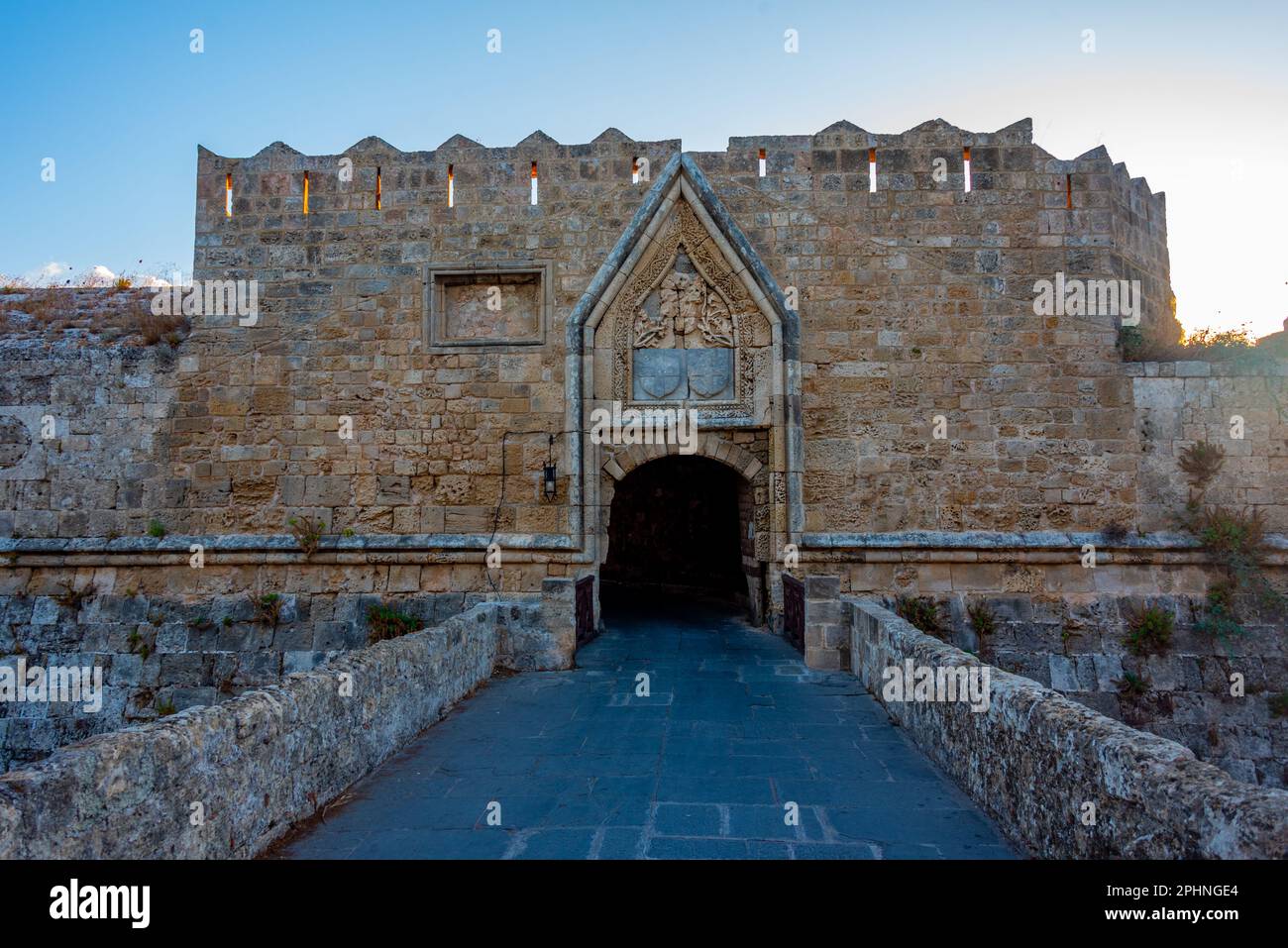 Sunrise view of the Saint Athanasios gate of Rhodes in Greece Stock ...