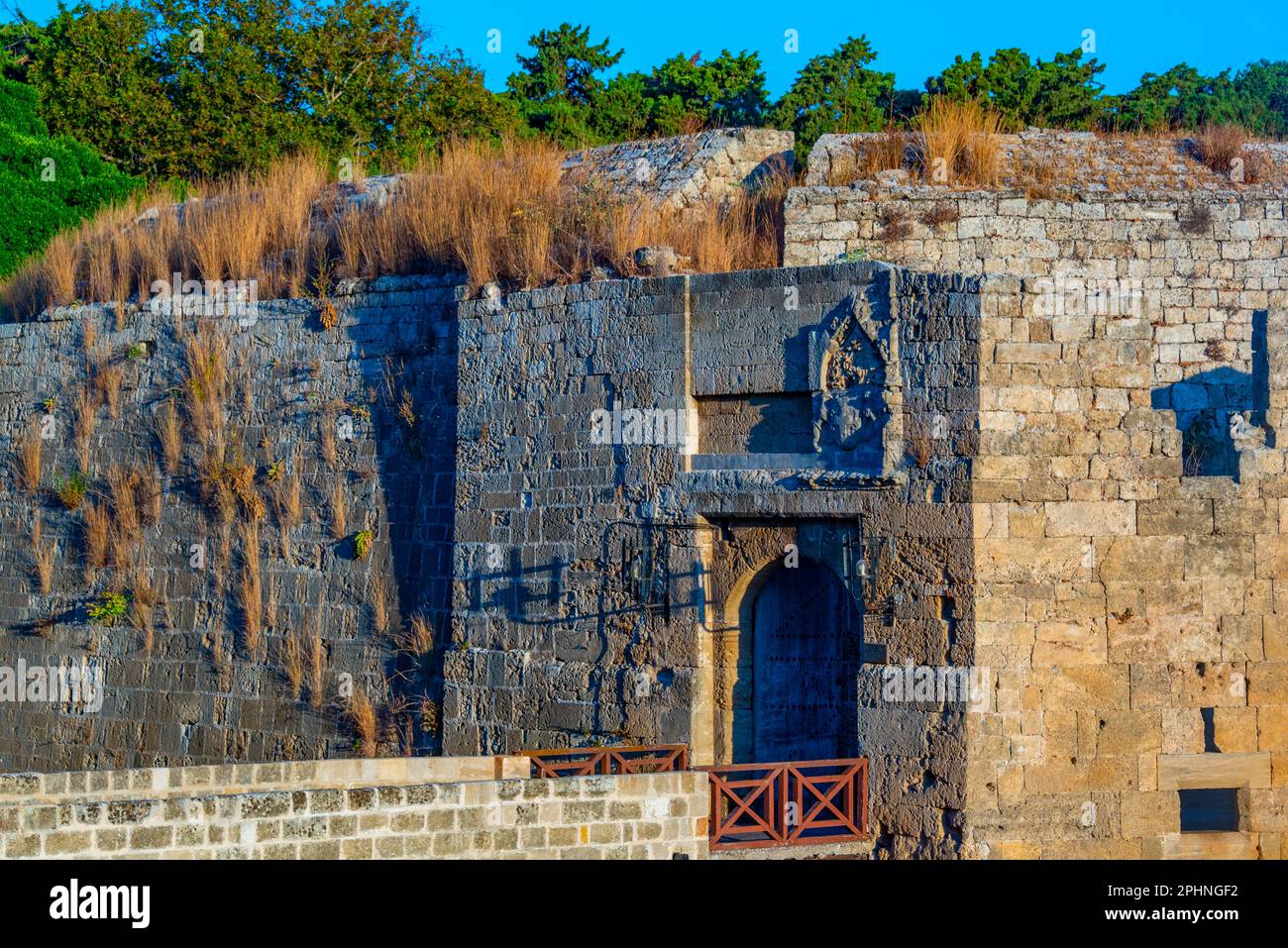 Sunrise view of the Saint Athanasios gate of Rhodes in Greece Stock ...