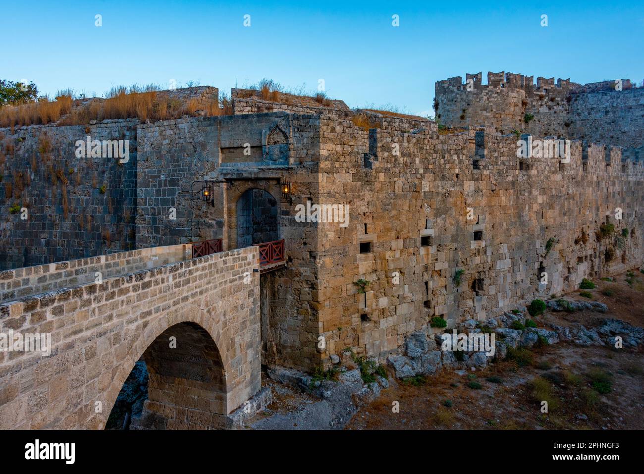 Sunrise view of the Saint Athanasios gate of Rhodes in Greece Stock ...