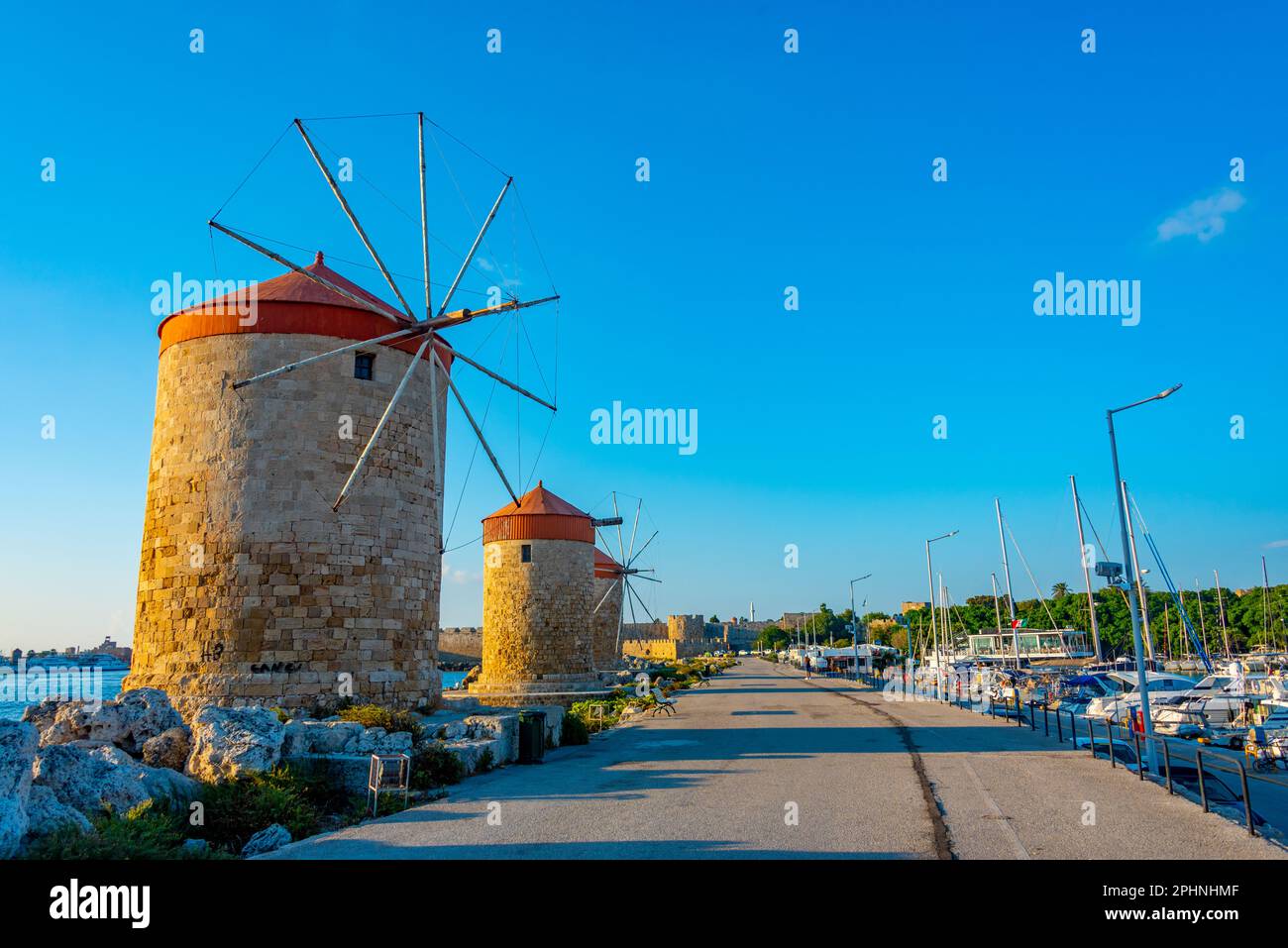 Ancient windmills at the port of Rhodes, Greece Stock Photo - Alamy