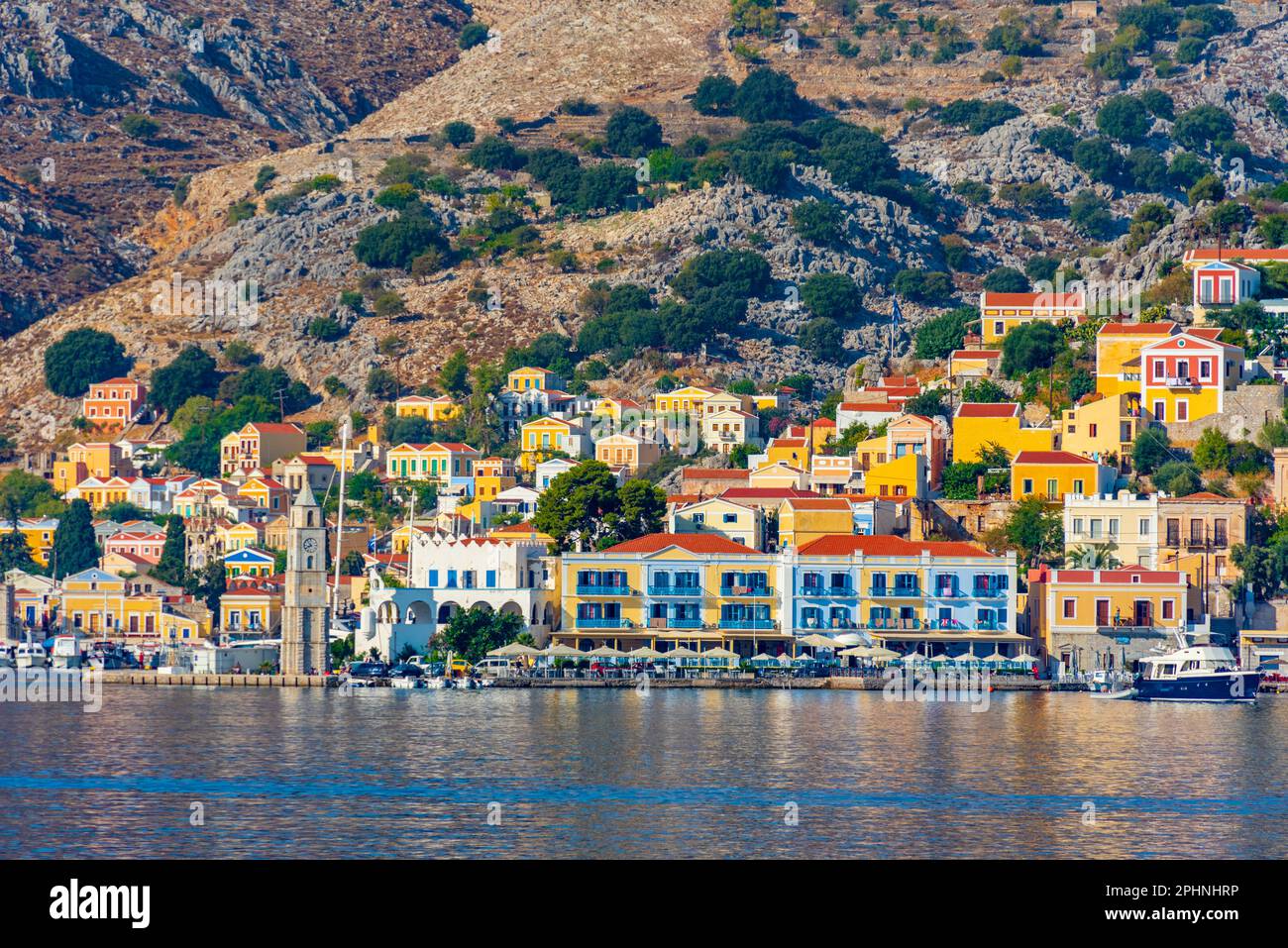 Colourful houses at waterfront of Greek island Symi Stock Photo - Alamy