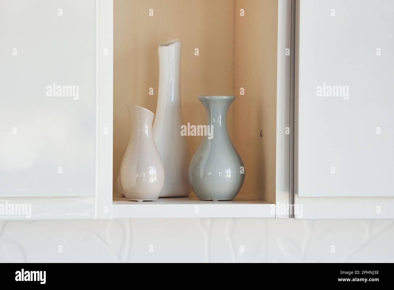 Three vases standing inside of the wall indoors at domestic room Stock ...