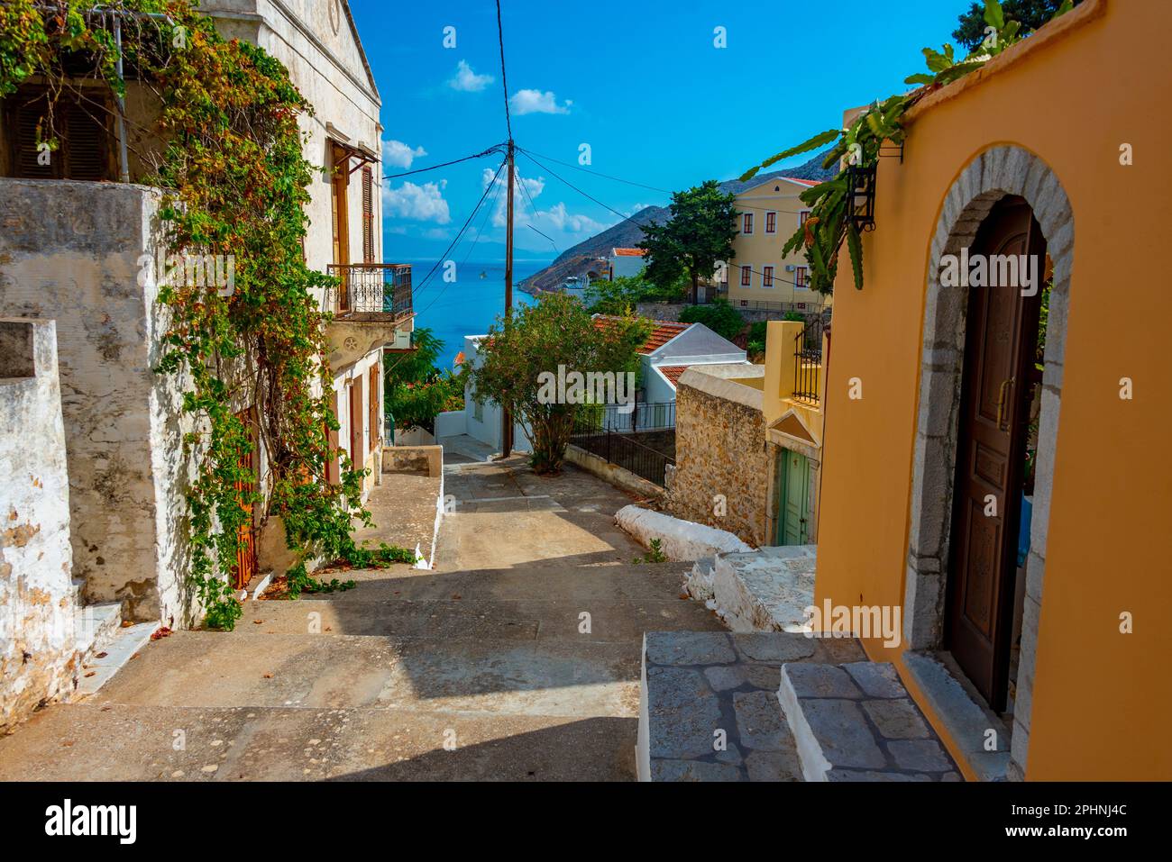 Colorful streets of a town at Greek island Symi Stock Photo - Alamy