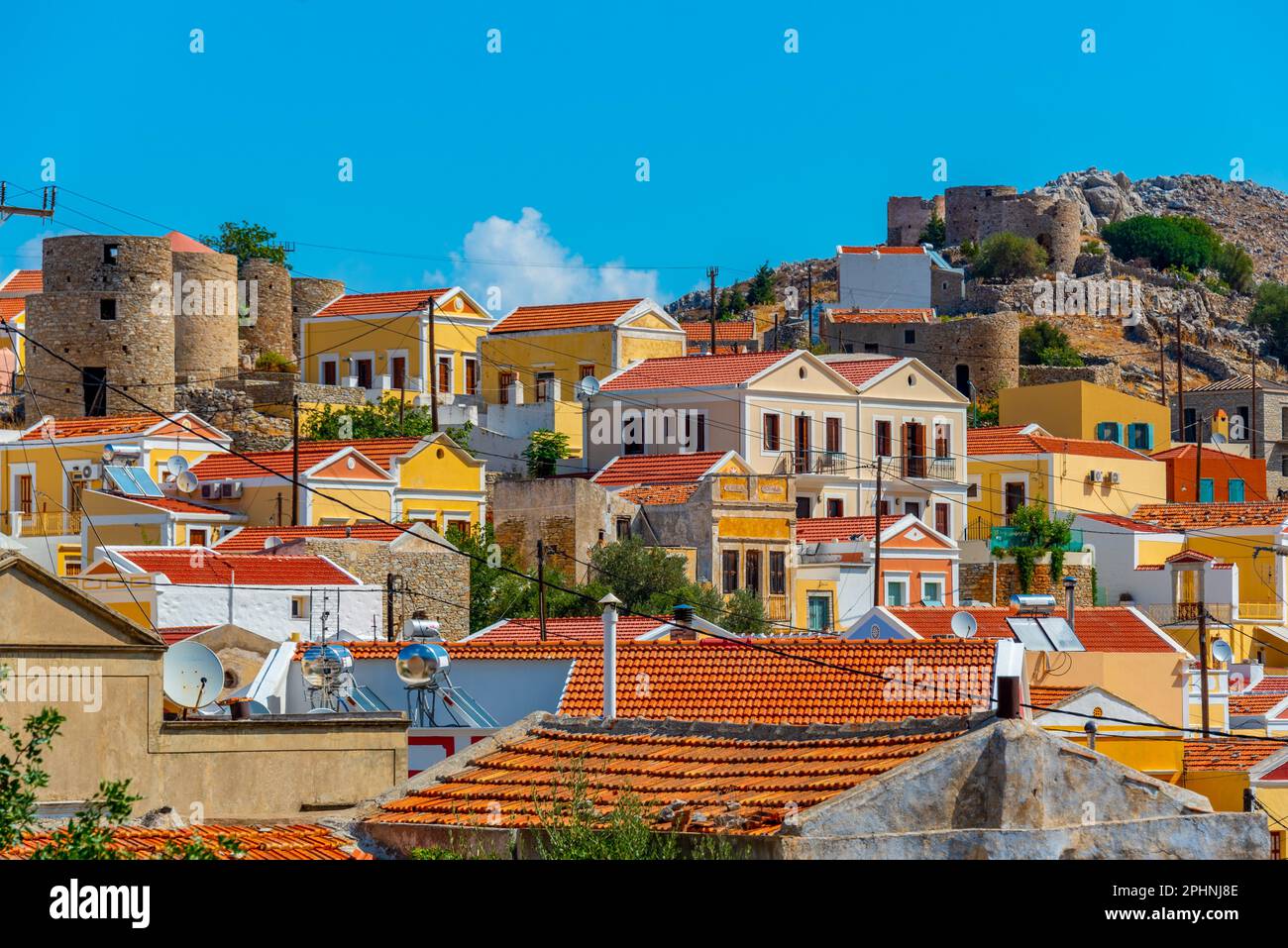 Colorful houses at Greek town Symi Stock Photo - Alamy