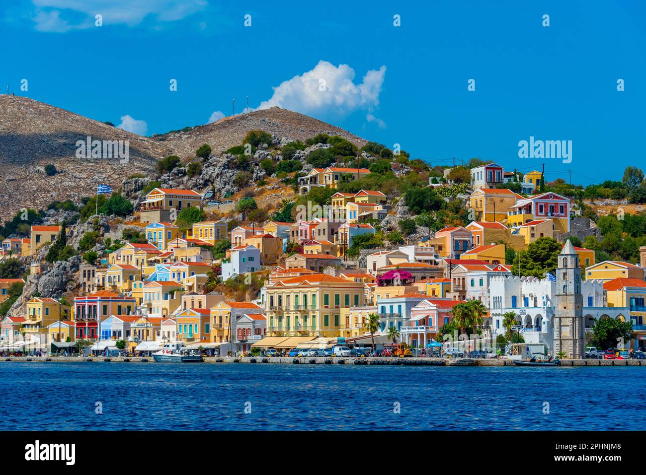 Colourful houses at waterfront of Greek island Symi Stock Photo - Alamy