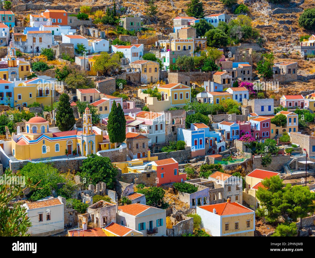 Colorful houses at Greek town Symi Stock Photo - Alamy