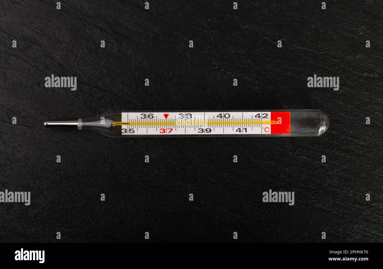 Medical Thermometer on Black Background, Temperature Measuring, Fever ...