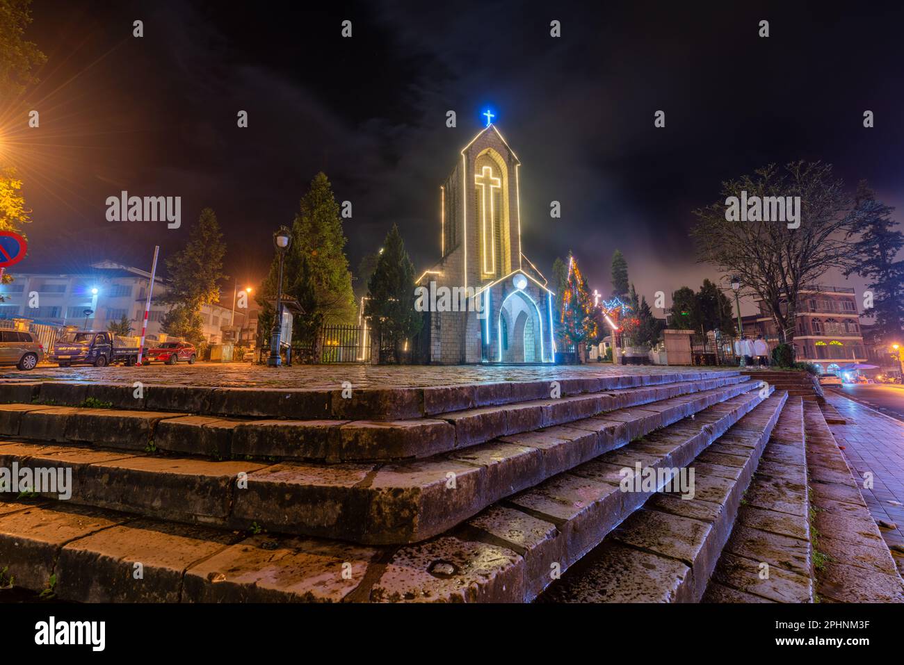 Ancient stone church of Sapa with mist night sky. Most popular ...
