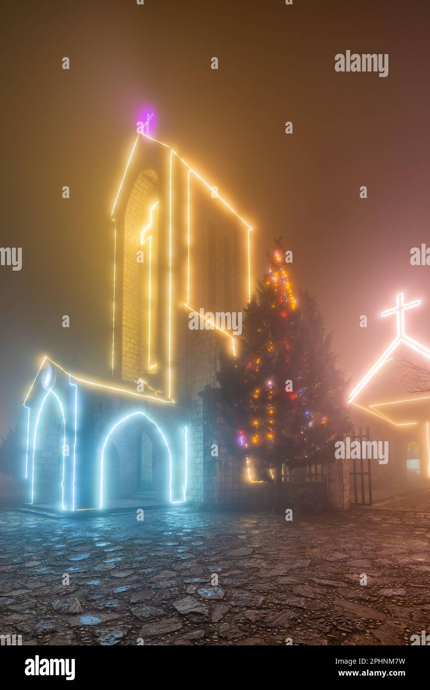 Ancient stone church of Sapa with mist night sky. Most popular ...