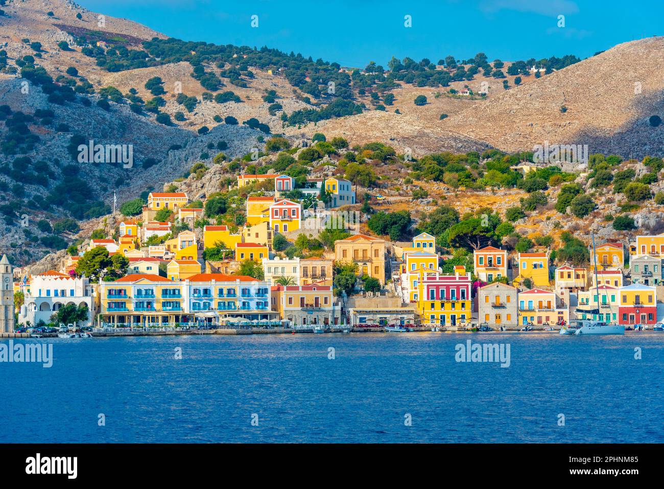 Colourful houses at waterfront of Greek island Symi Stock Photo - Alamy