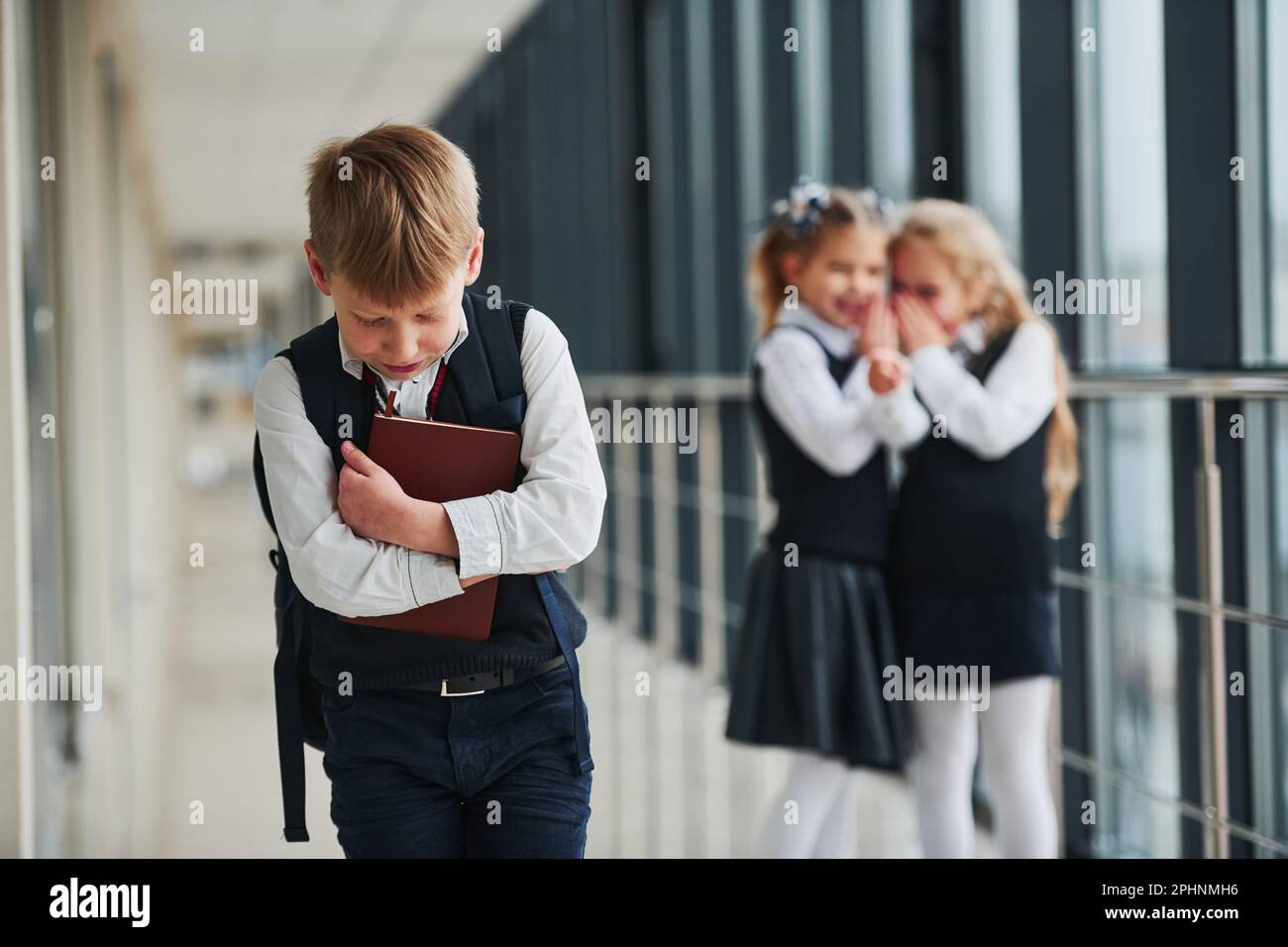 Little boy gets bullied. Conception of harassment. School kids in ...