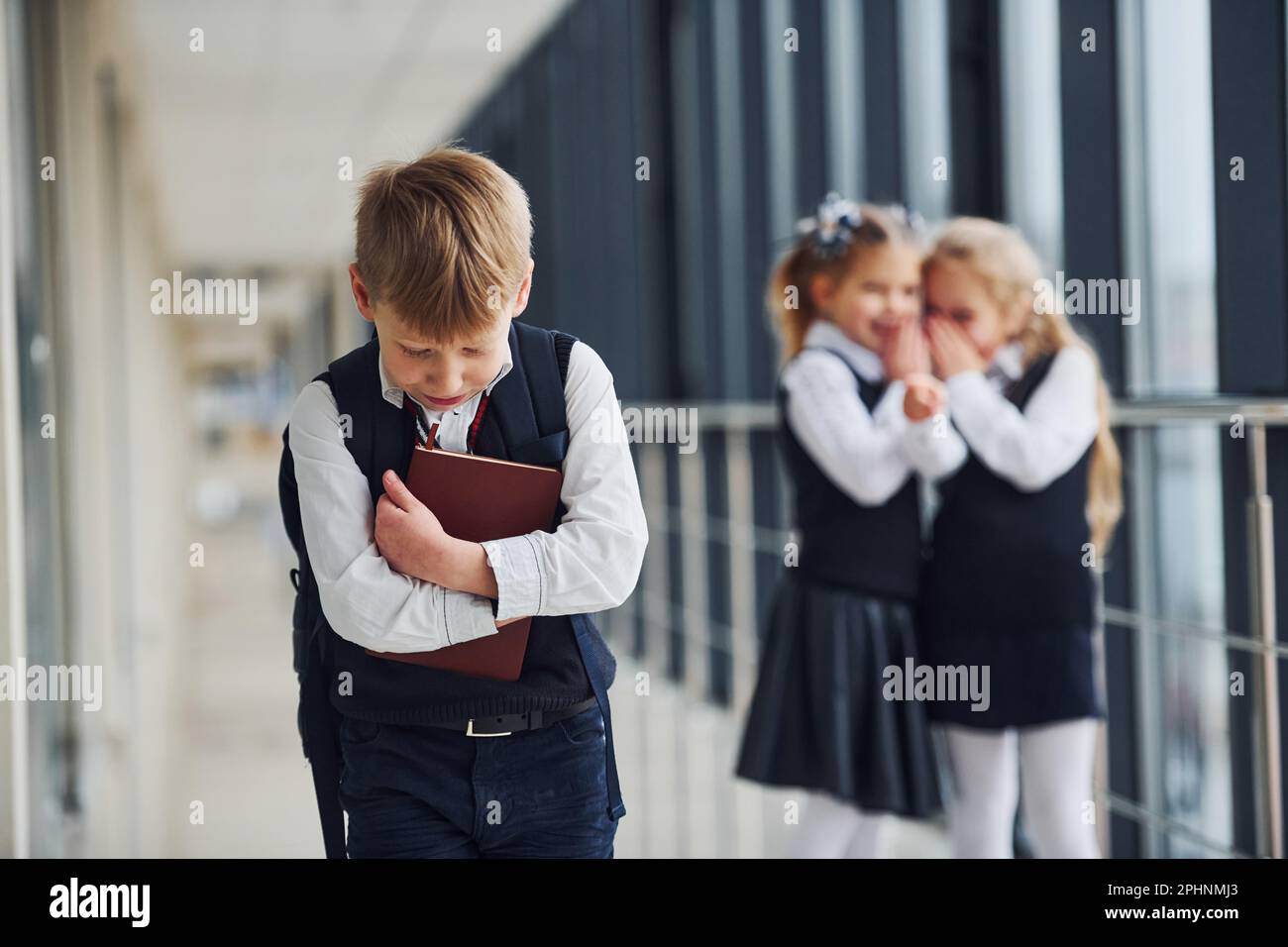 Little boy gets bullied. Conception of harassment. School kids in ...