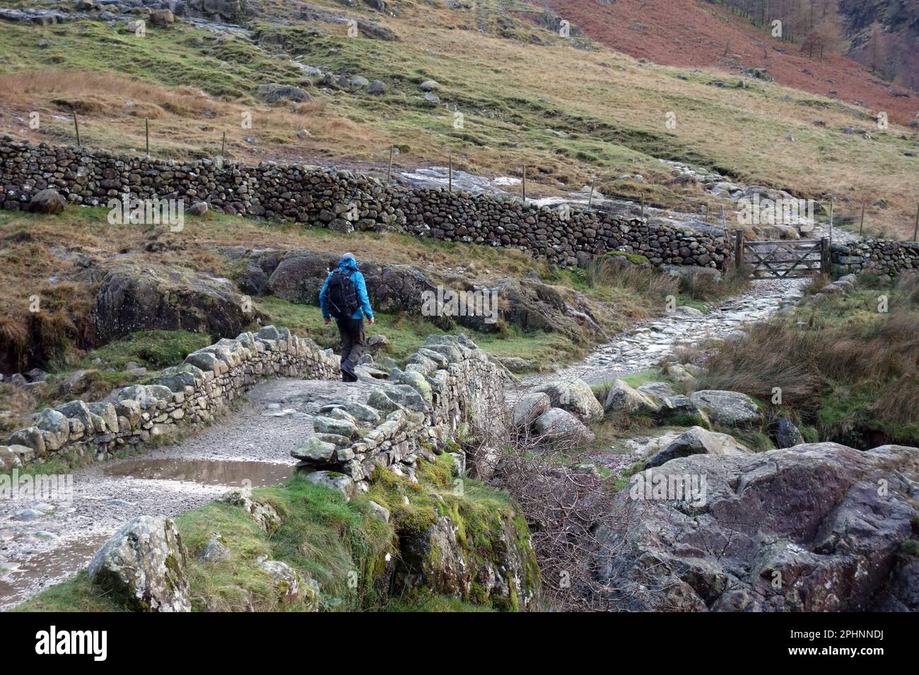 Man Walking on Stockley Packhorse Bridge on Route to Scafell Pike via ...
