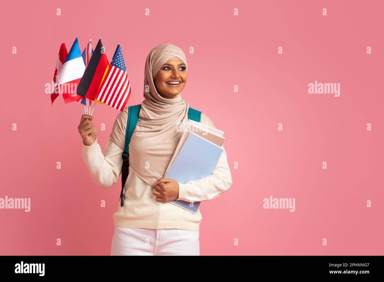 Study Abroad. Portrait Of Muslim Female Student With International ...