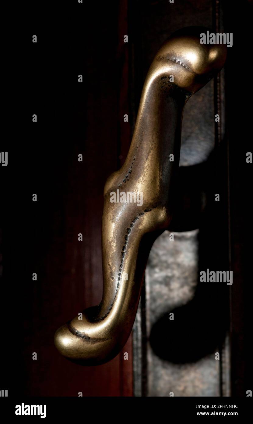 Antique brass handle of old windows in Tuscany, Italy Stock Photo - Alamy
