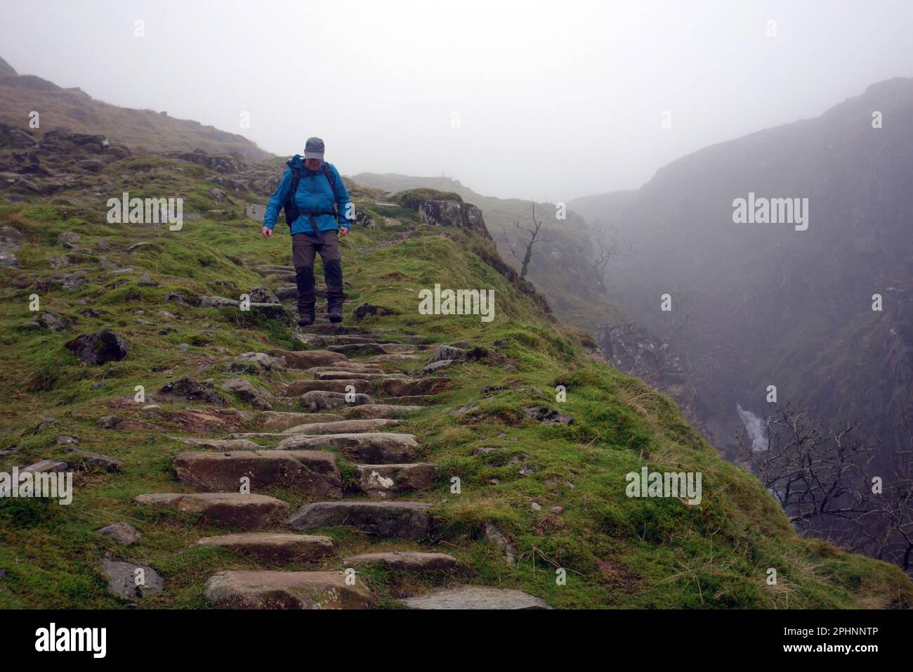 Hiker walking down footpath hi-res stock photography and images - Alamy