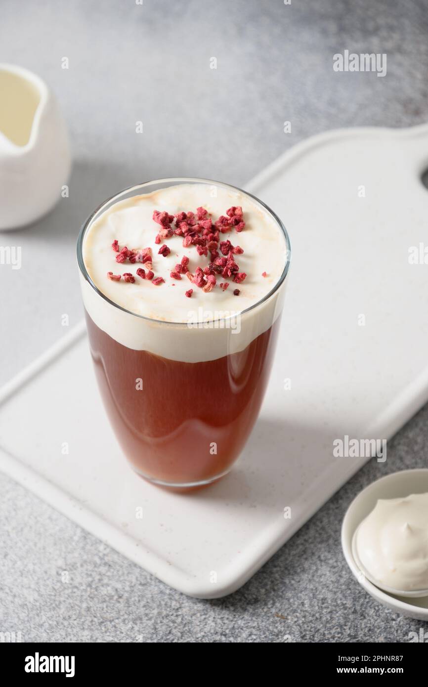 Cheese tea asian beverage with black tea and layer of cream cheese foam ...