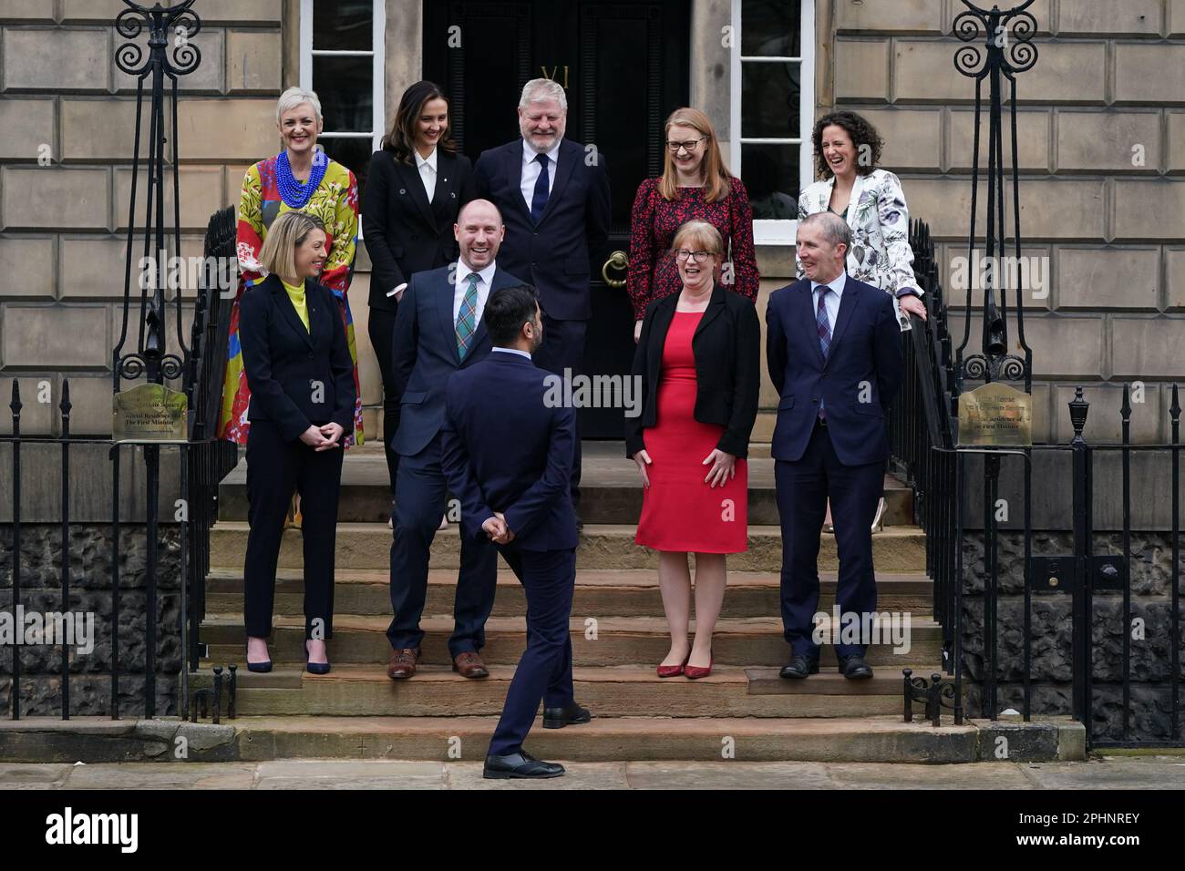 Newly elected First Minister of Scotland Humza Yousaf (centre) with his ...