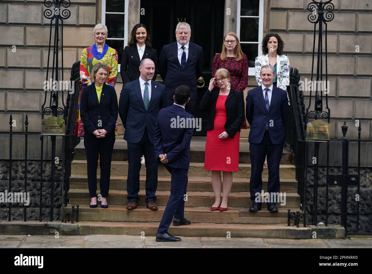 Newly elected First Minister of Scotland Humza Yousaf (centre) with his ...