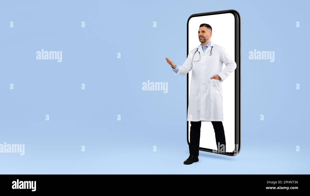 Telemedicine concept. Male doctor in white uniform coming out huge ...