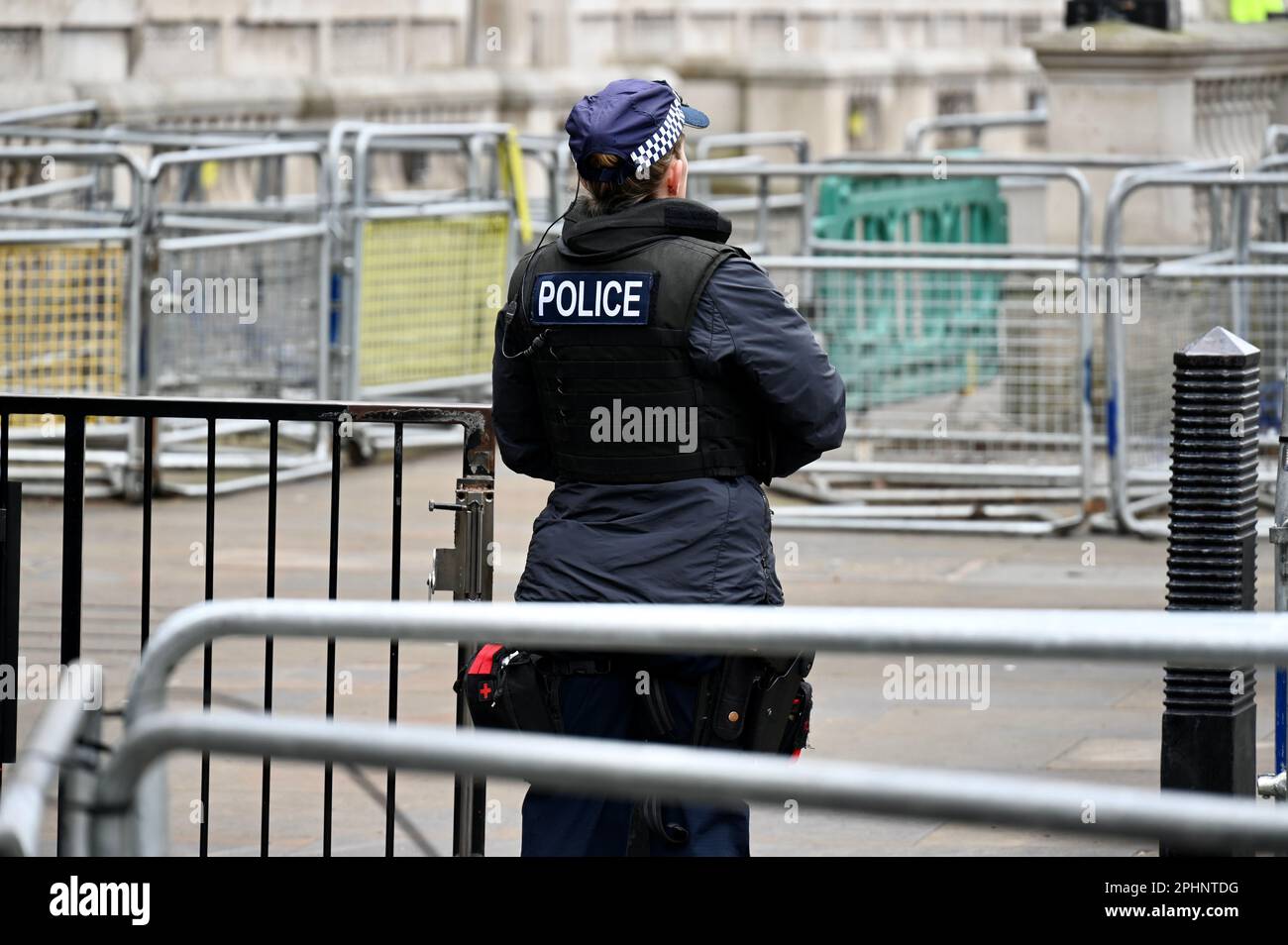 Back view of Female Police Officer, Entrance to Downing Street ...