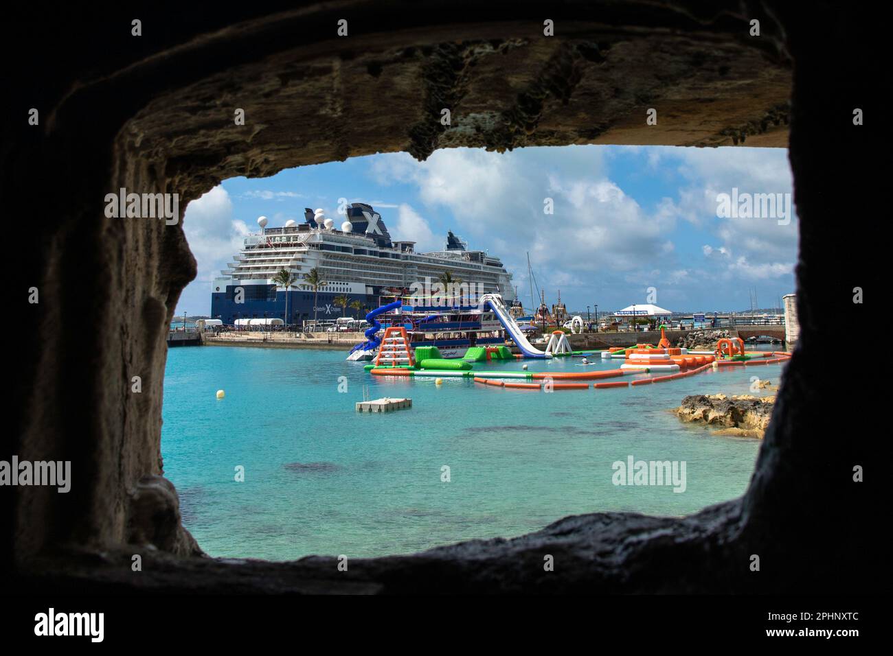 A massive cruise ship is seen docked at the Royal Naval Dockyard at the ...