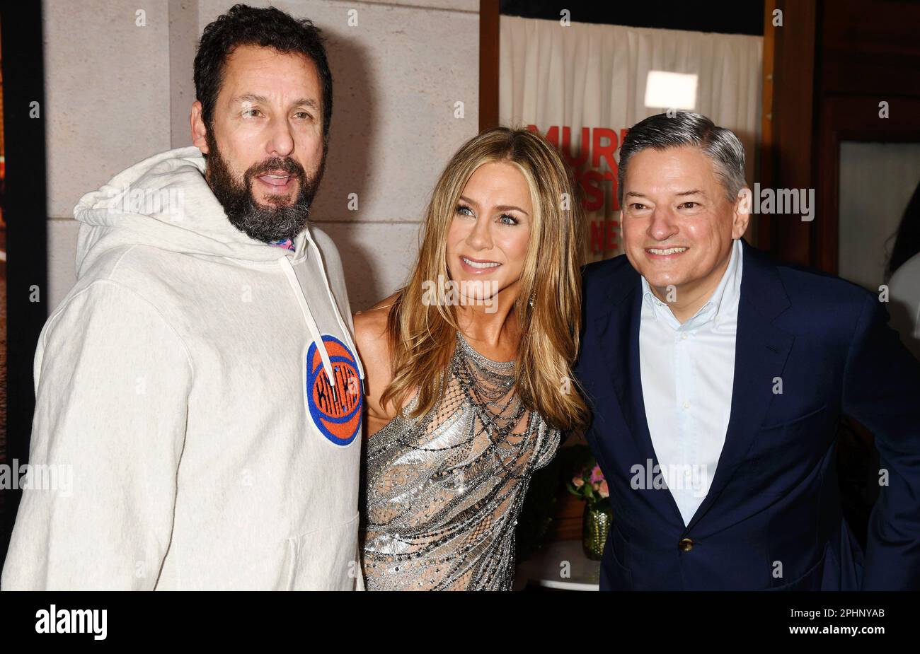 LOS ANGELES, CALIFORNIA - MARCH 28: (L-R) Adam Sandler, Jennifer Aniston and Ted Sarandos, Chief ...