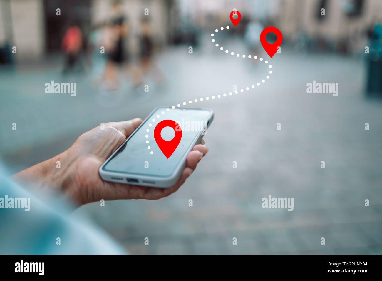 Woman tourist use maps app to navigate city, plan route from location ...