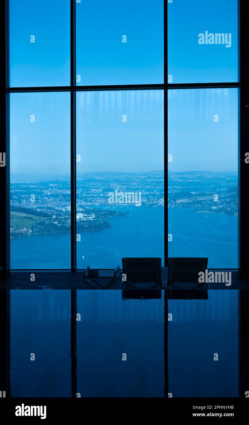 Infinity Swimming Pool with Window View over City and Lake Lucerne in ...