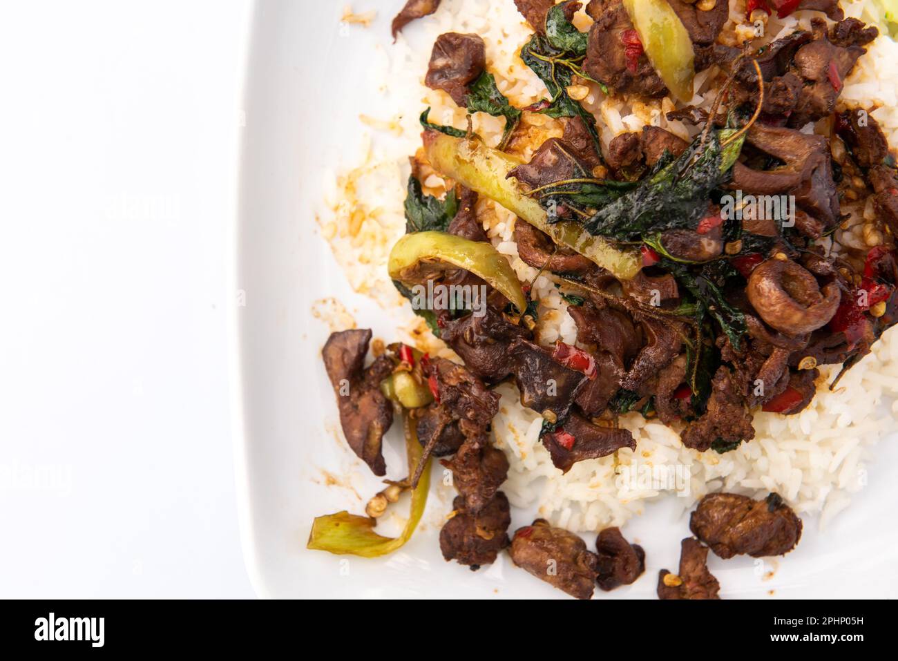 Stir Fried Basil with Chicken offal Entrails on Rice Stock Photo - Alamy
