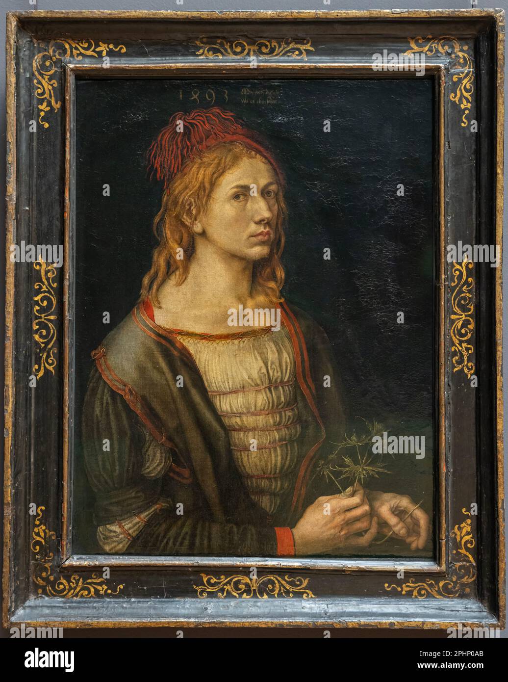 Paris, France - 02 19 2023: Le Louvre Museum. Self-Portrait holding a thistle painted by ...