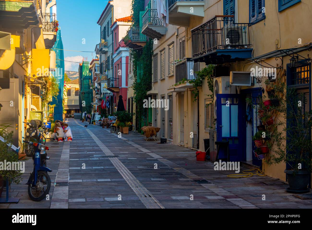 Narrow street in Greek town Nafplio Stock Photo - Alamy
