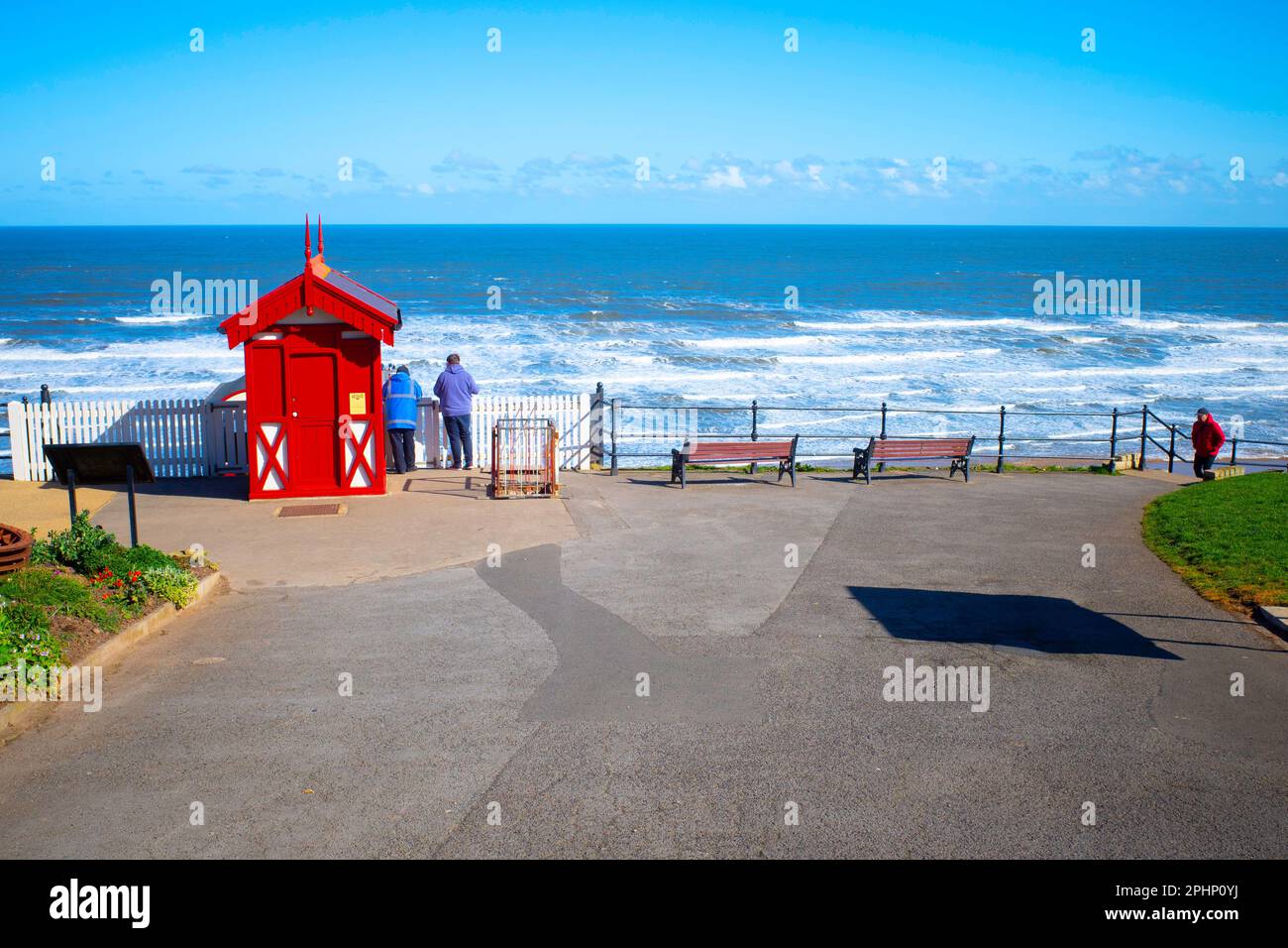 The top station of the Saltburn Cliff Funicular tramway with a man and ...