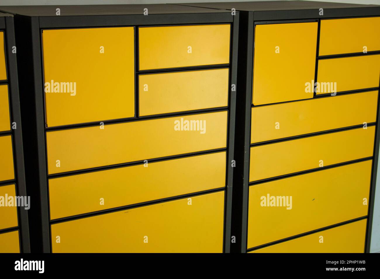Yellow and black locker where you can pick up logistics packages Stock ...