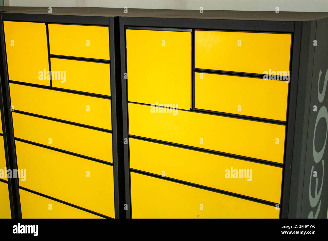 Yellow and black locker where you can pick up logistics packages Stock ...