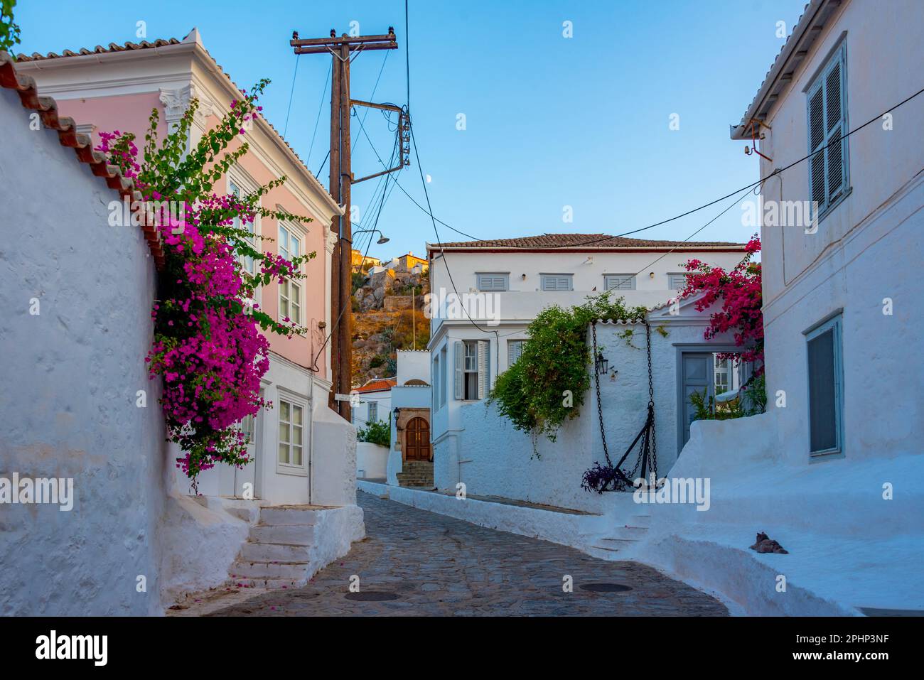 Summer day on a street in Greek town Hydra Stock Photo - Alamy