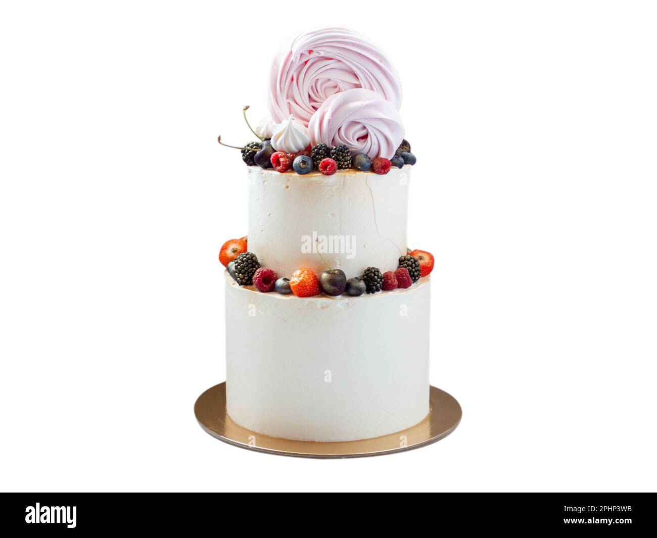 Tall and bright unicorn cake with chocolate, meringue swirls and ...