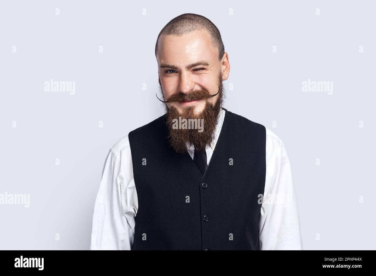 Portrait of positive happy handsome man with beard and mustache ...