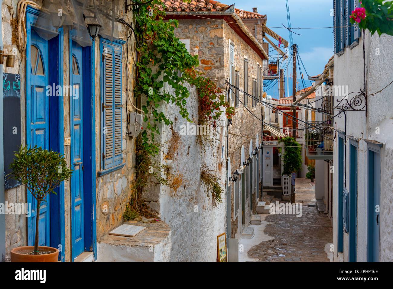 Summer day on a street in Greek town Hydra Stock Photo - Alamy